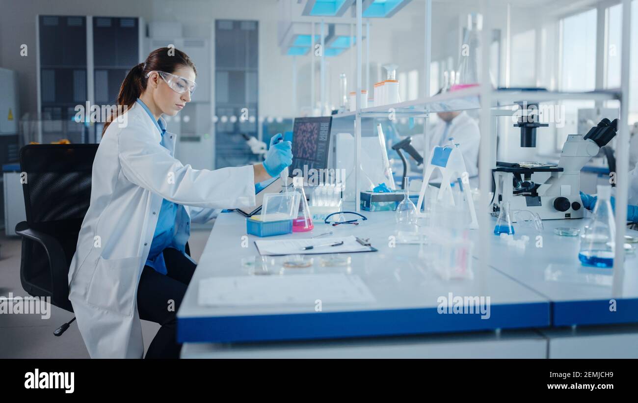 Female male researcher talking sample hi-res stock photography and ...