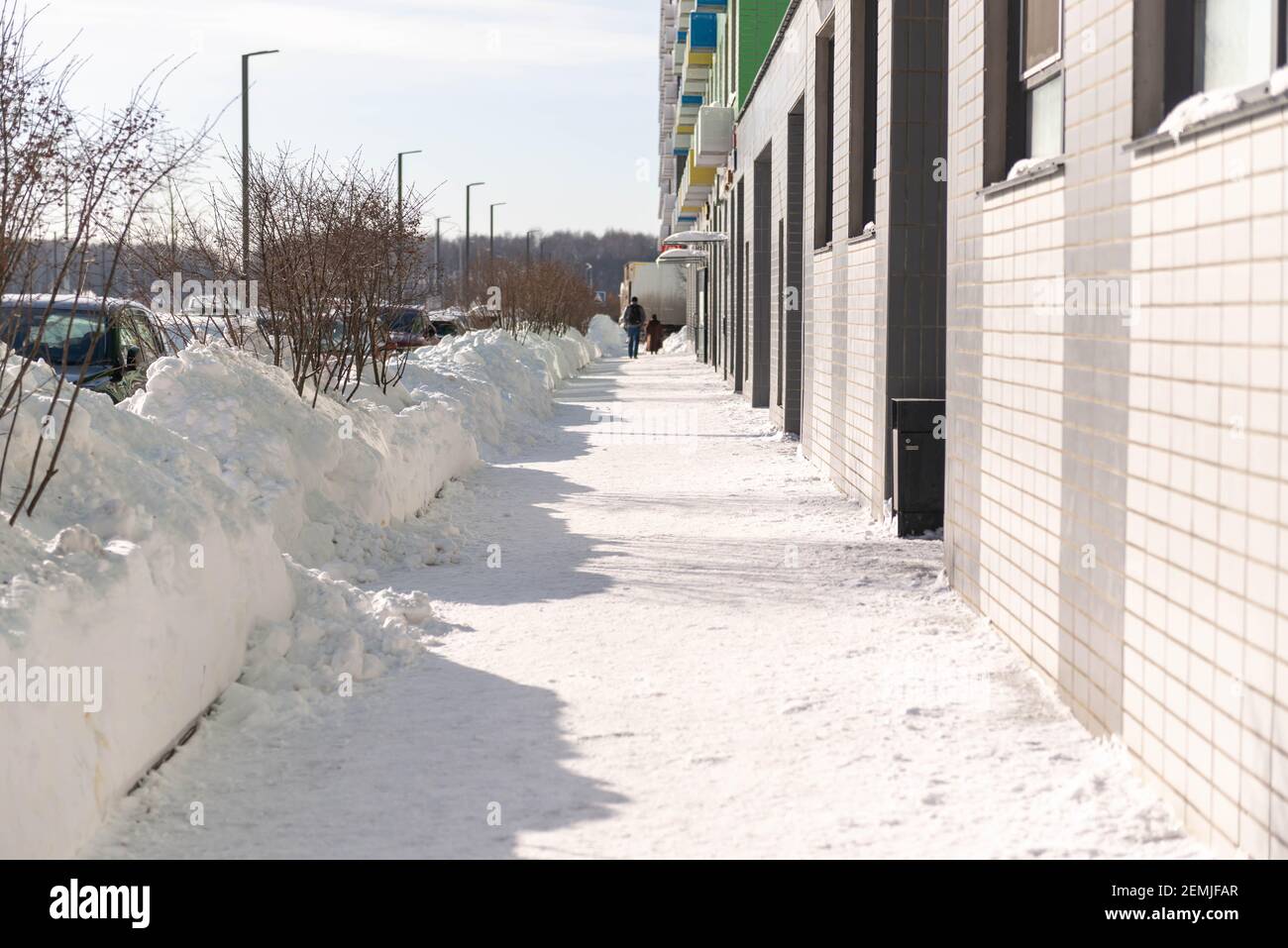 Moscow. Russia. February 2021. Cleared the snow from the paths after a ...