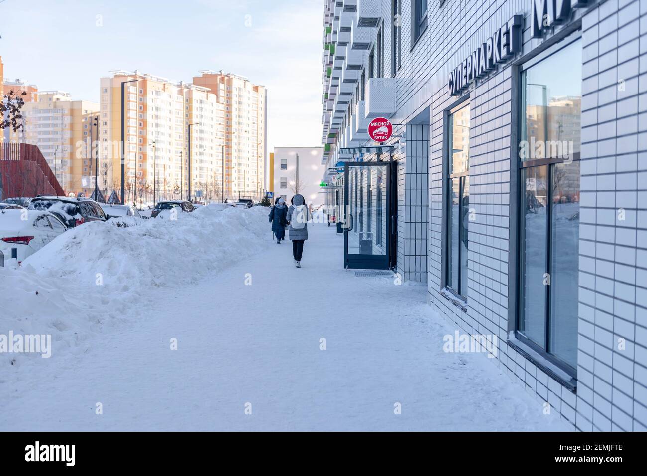 Moscow. Russia. February 2021. Cleared the snow from the paths after a ...