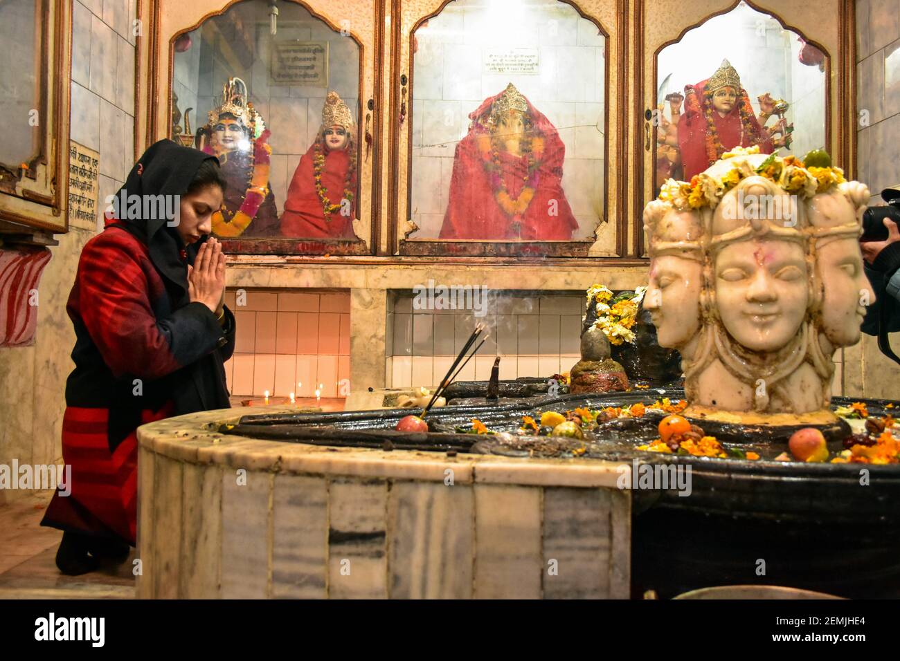 A Hindu devotee seen praying during the occasion of Maha Shivratri at a ...
