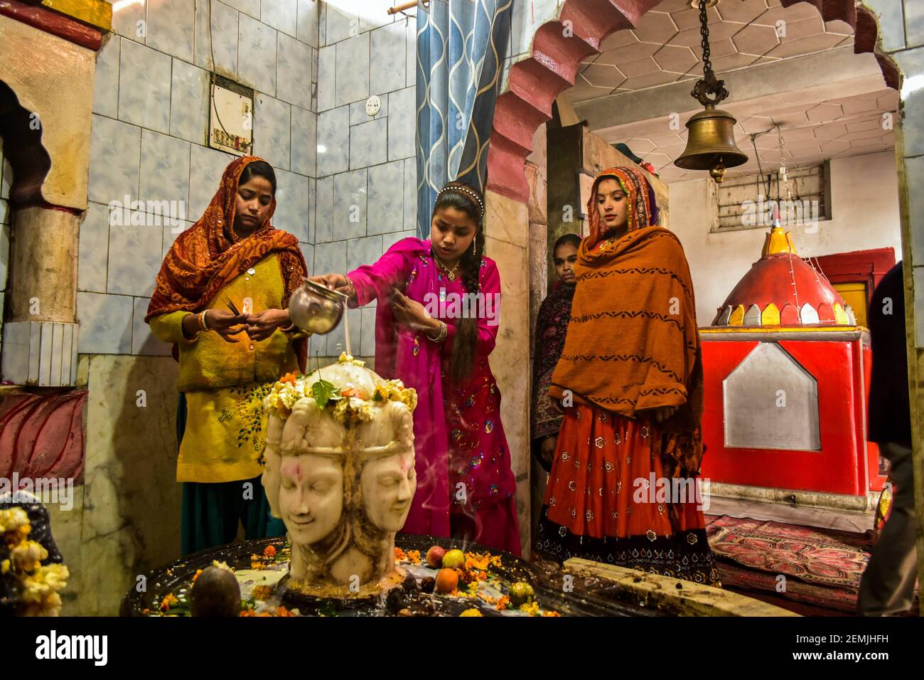 Hindu devotees are seen performing rituals during the occasion of Maha ...