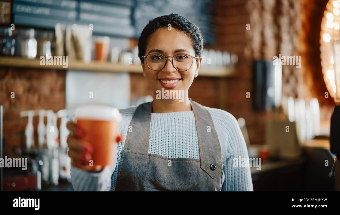 Beautiful Latin American Female Barista with Short Hair and Glasses is ...