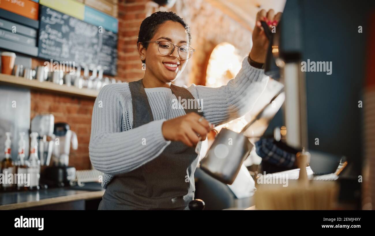 Male cashier hi-res stock photography and images - Alamy