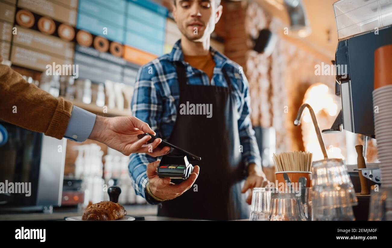 Caucasian Customer Pays for Coffee and Pastry with Contactless NFC ...