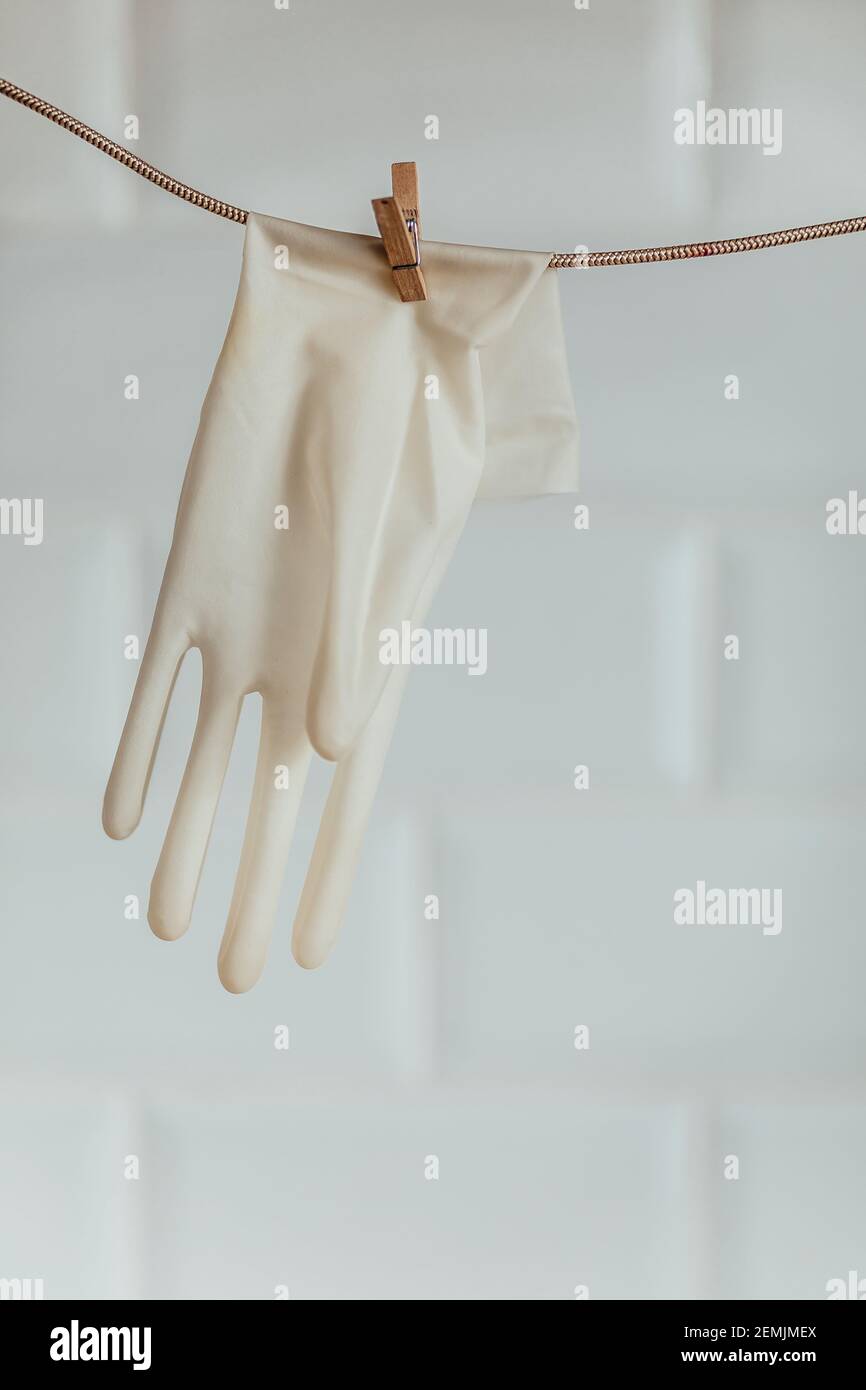 reuse rubber gloves: ecological post-virus concept. Wooden Clothespins ...