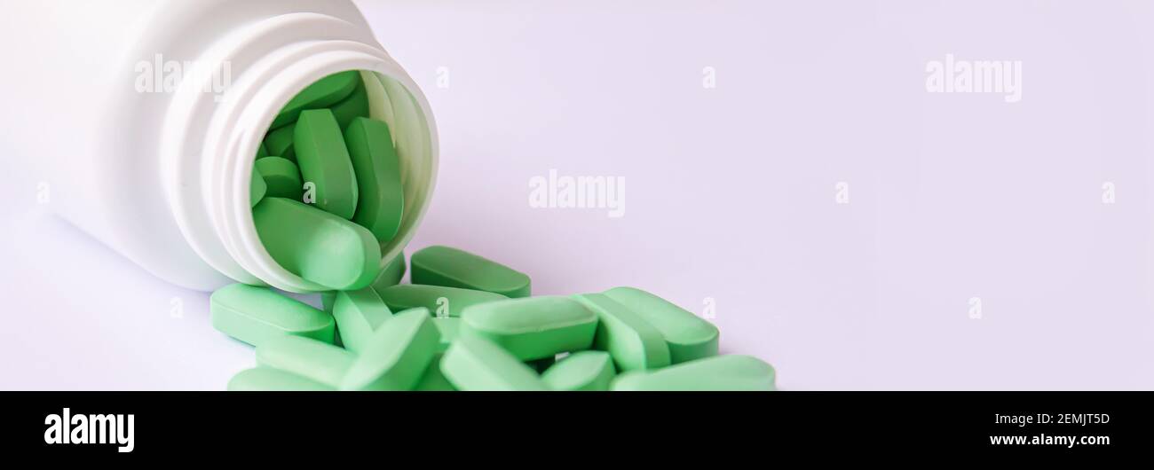 Vitamin tablets used as a dietary supplement.green tablets..selective ...