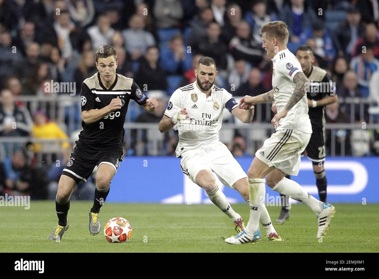 Real Madrid's Karim Benzema, Toni Kroos and AFC Ajax's Joel Veltman ...