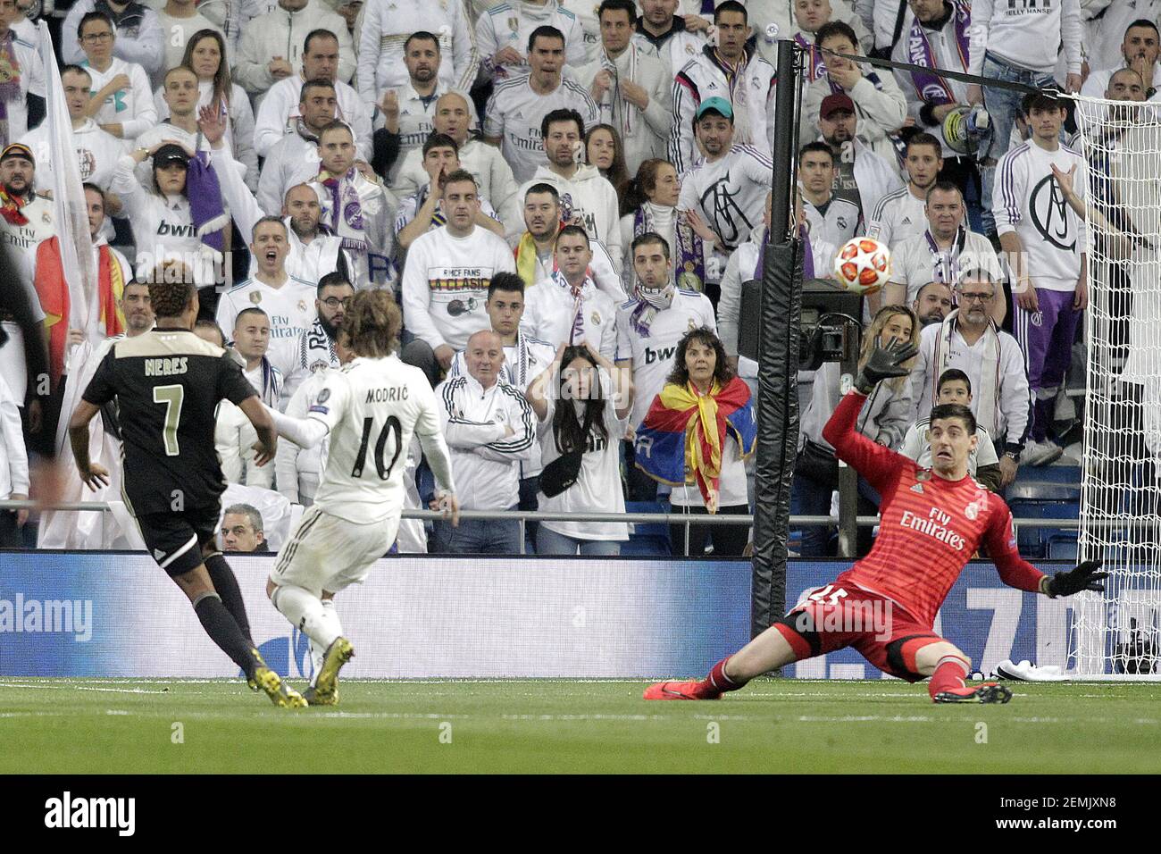 Real Madrid's Luka Modric, Thibaut Courtois and AFC Ajax's David Neres ...
