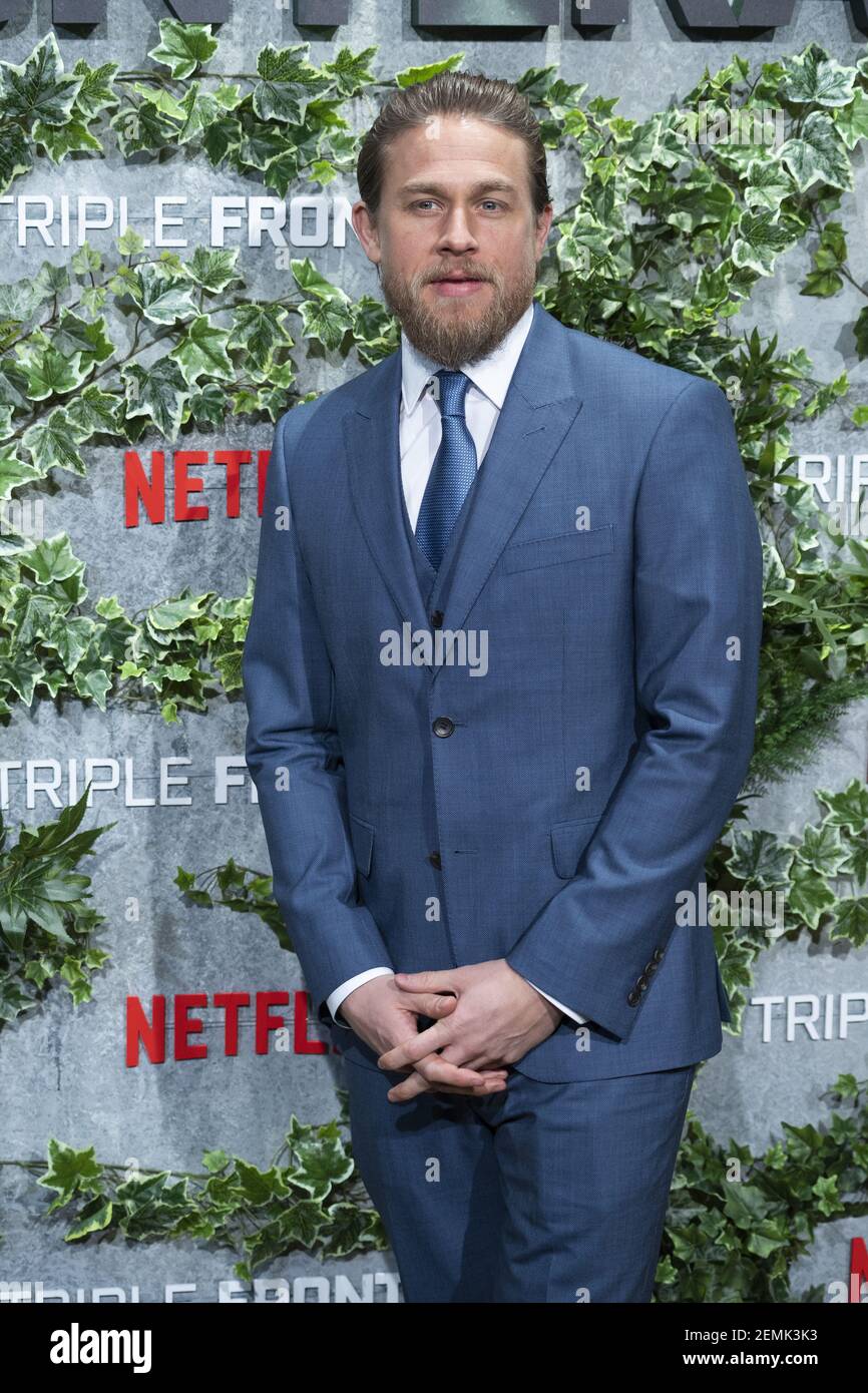 British actor Charlie Hunnam poses as he arrives at the premiere of the ...