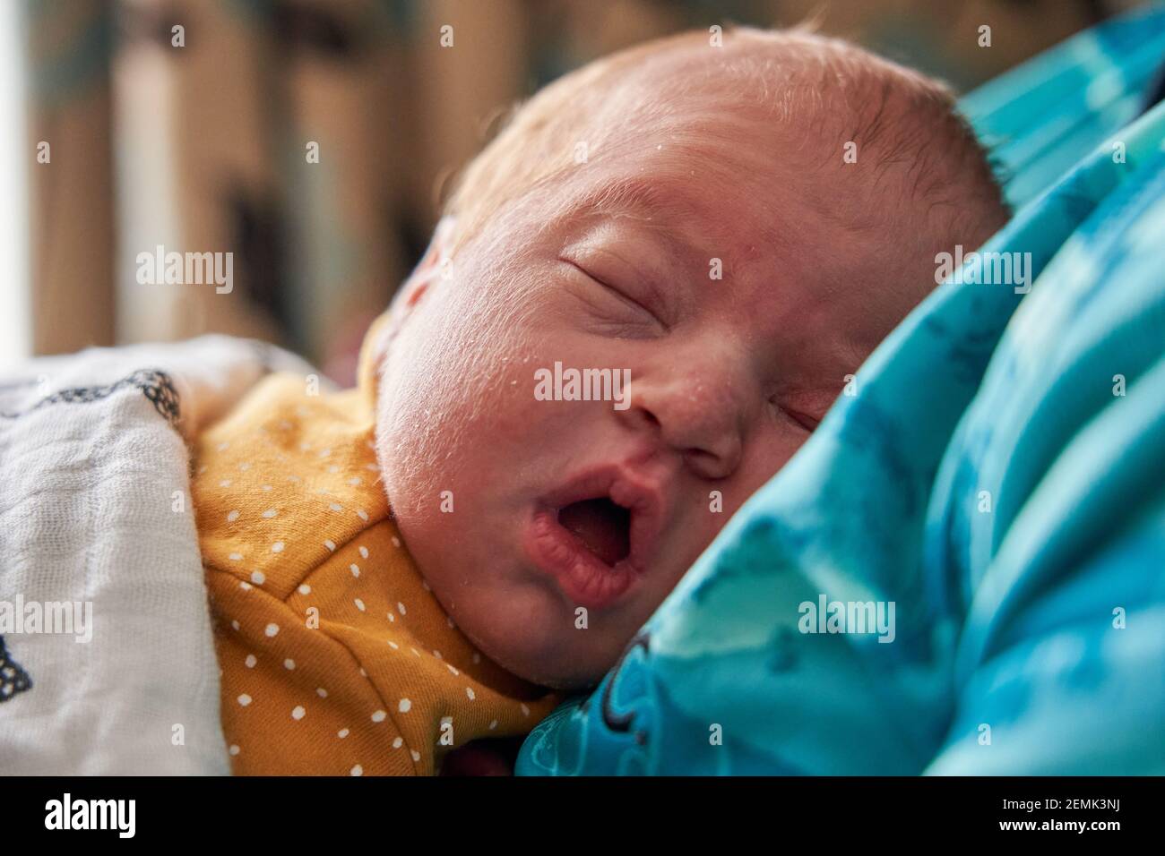 The facial expressions of a new born baby girl Stock Photo - Alamy