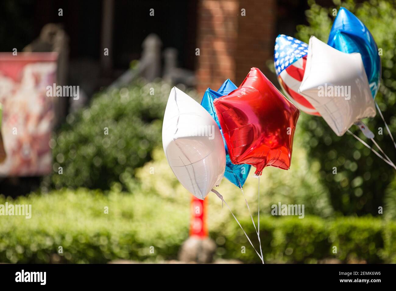 Multiple Red, White, and Blue Star Shaped Balloons Floating in the Wind ...
