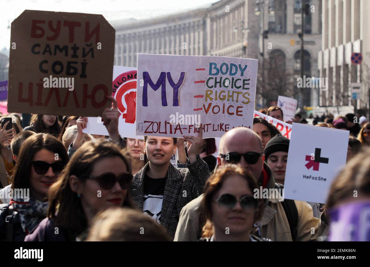 Protesters are seen holding placards during the protest. Ukrainian ...