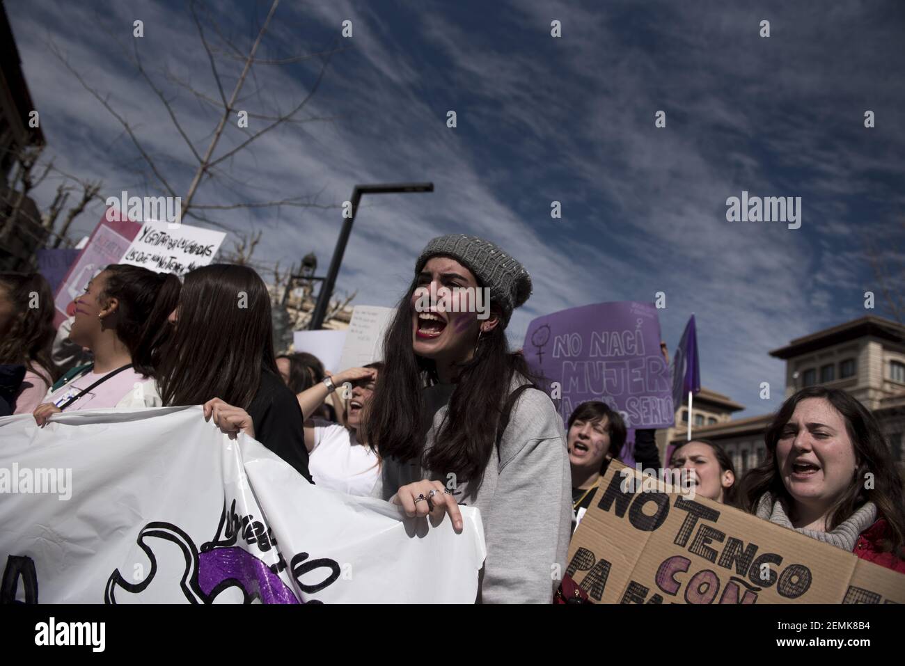 A student is seen shouting slogans during the strike. Spanish people ...