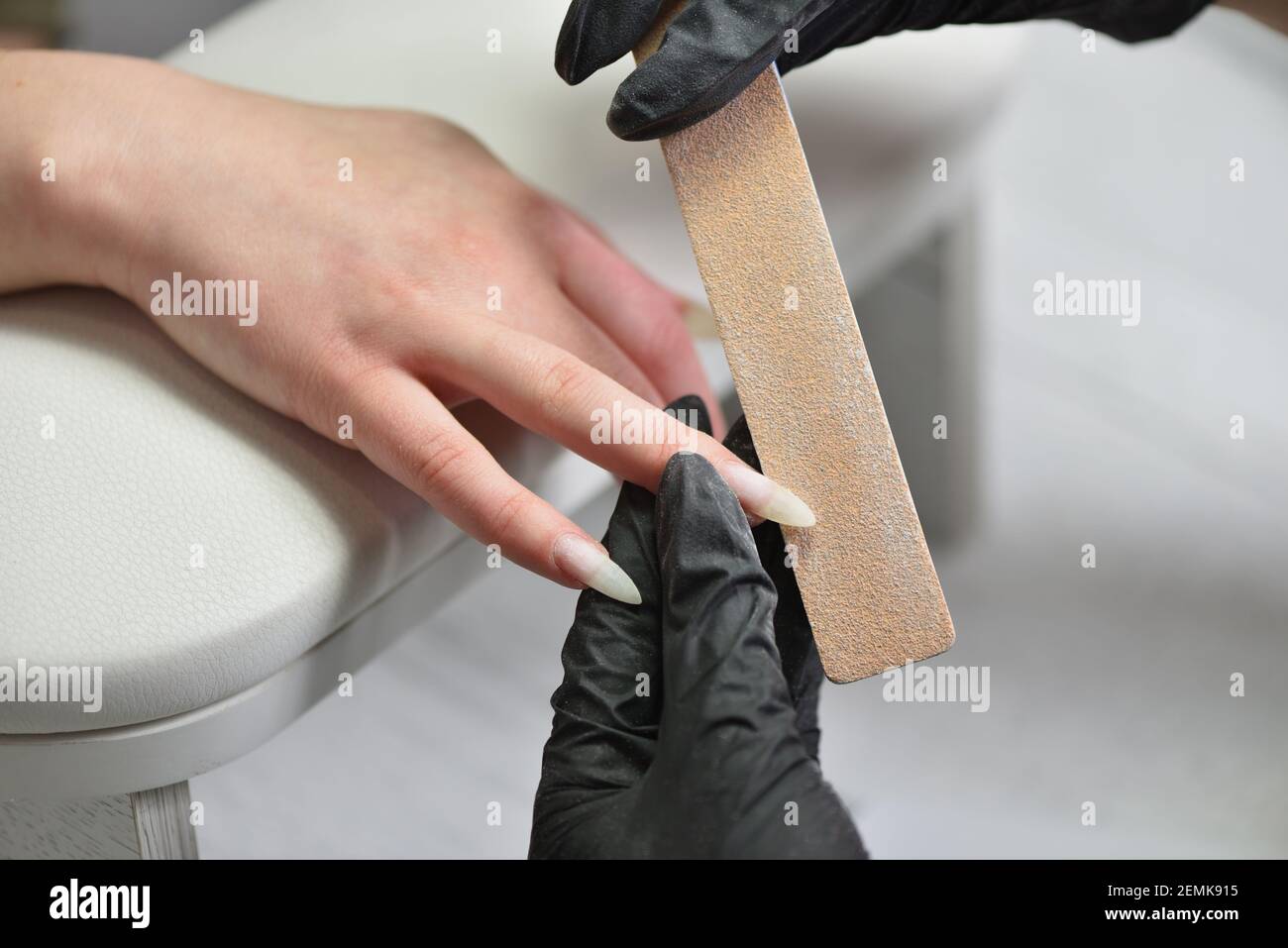 Woman nail filing hi-res stock photography and images - Alamy