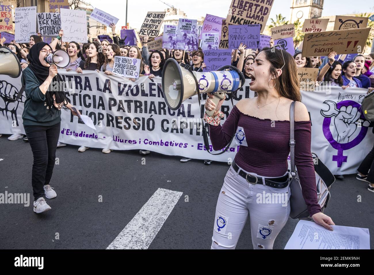 Women seen shouting slogans using megaphones during the protest ...