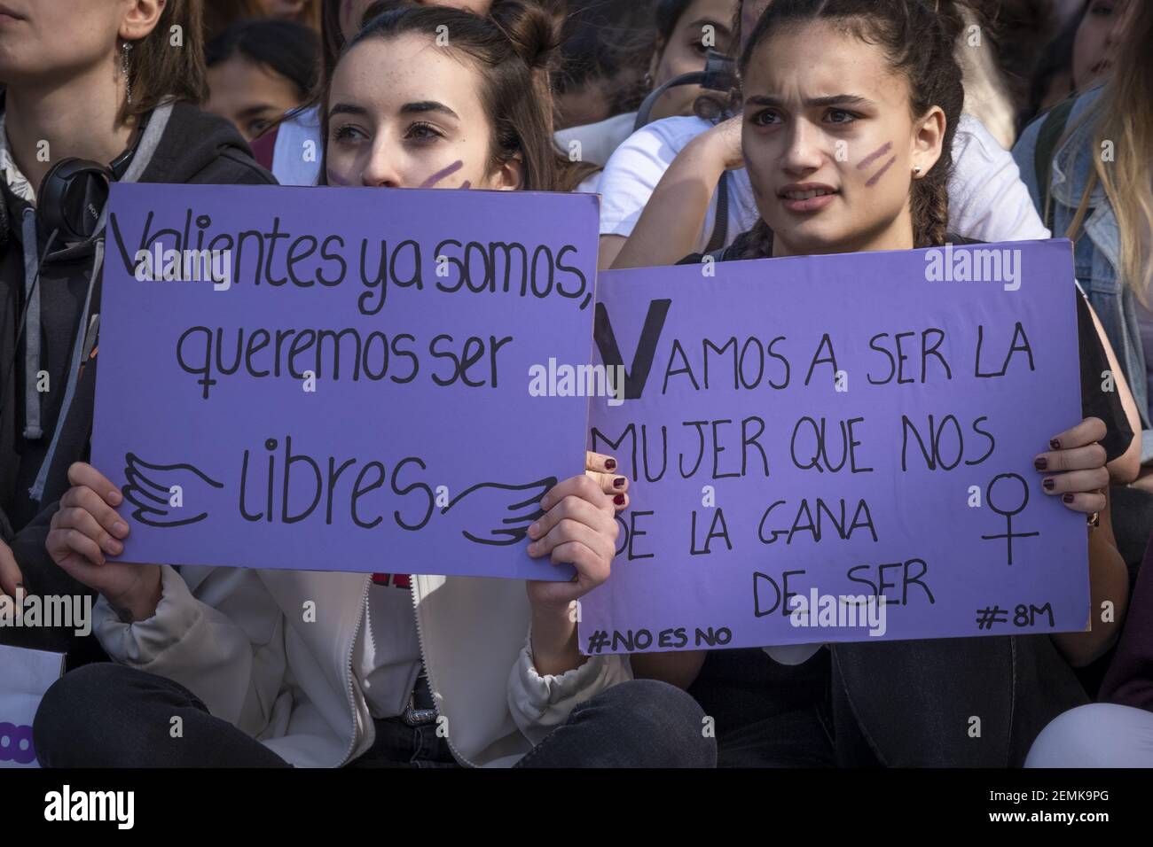 Women seen holding placards during the protest. Hundreds of students ...
