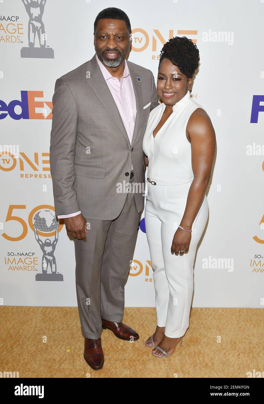 (L-R) Derrick Johnson and Tamika Johnson at the 50th NAACP Image Awards ...