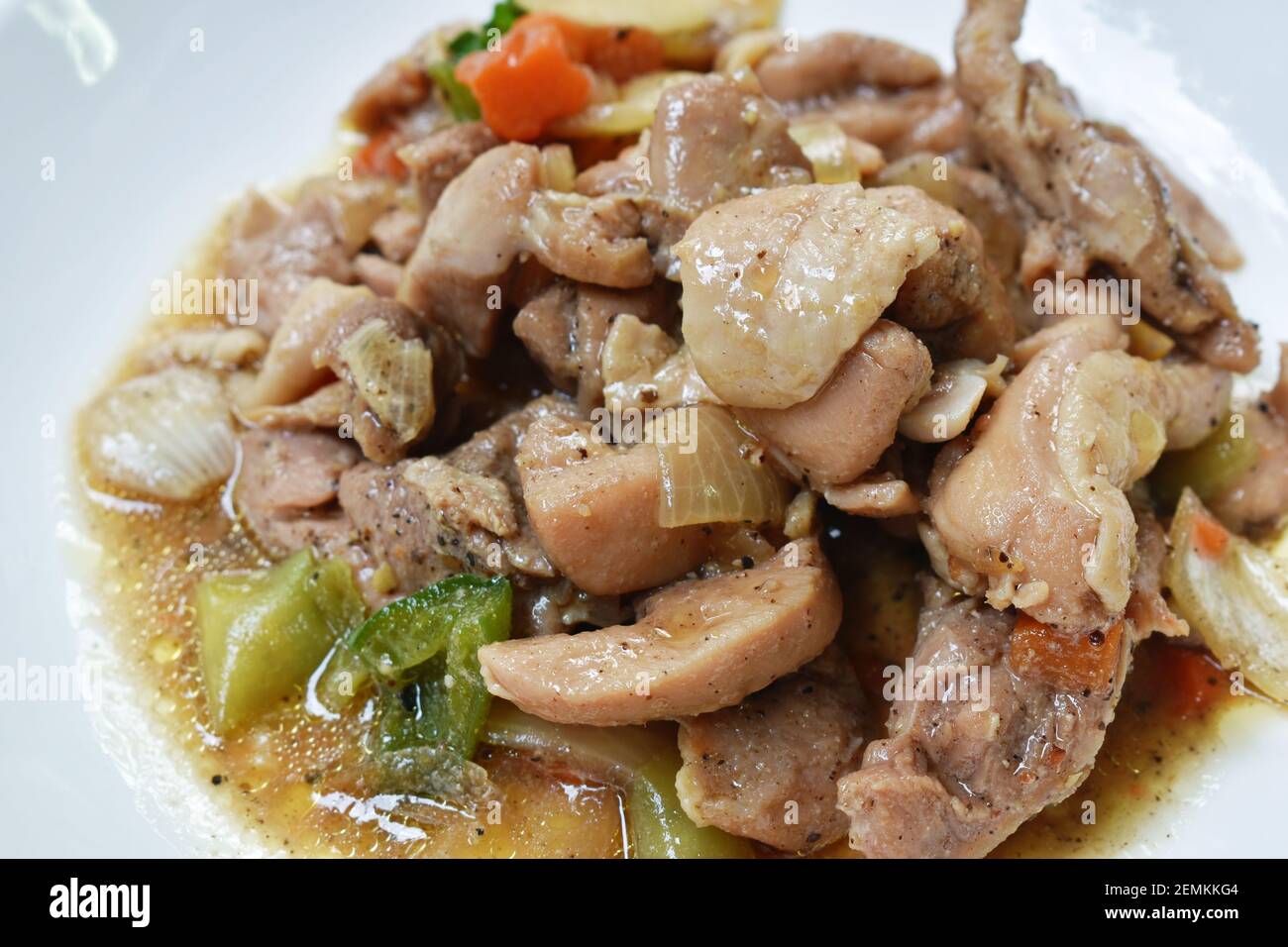 fried chicken with slice sweet bell chili black pepper sauce on palte ...