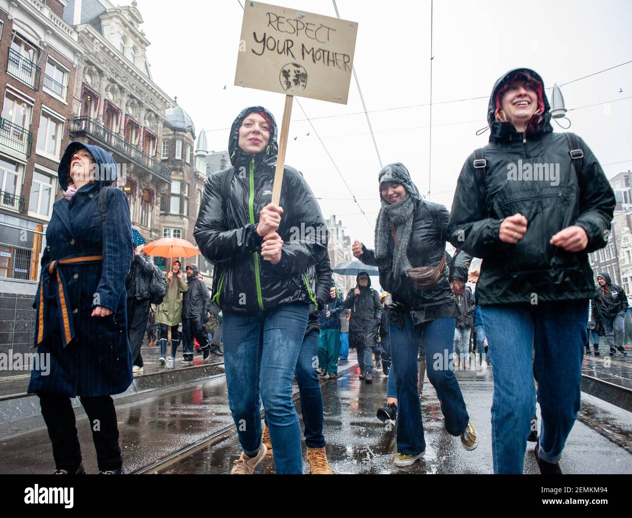 A group of women are dancing during the Climate march in Amsterdam on ...