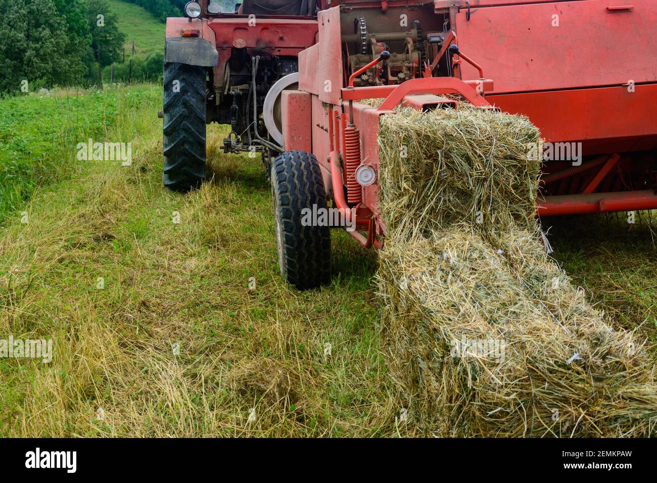 Hay baling press hi-res stock photography and images - Alamy