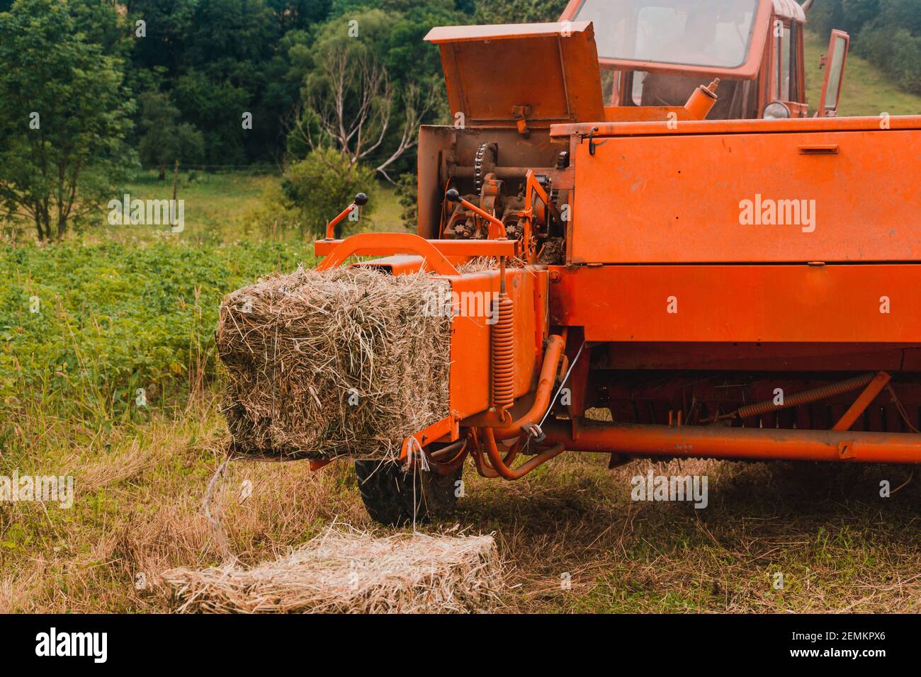 Hay baling press hi-res stock photography and images - Alamy