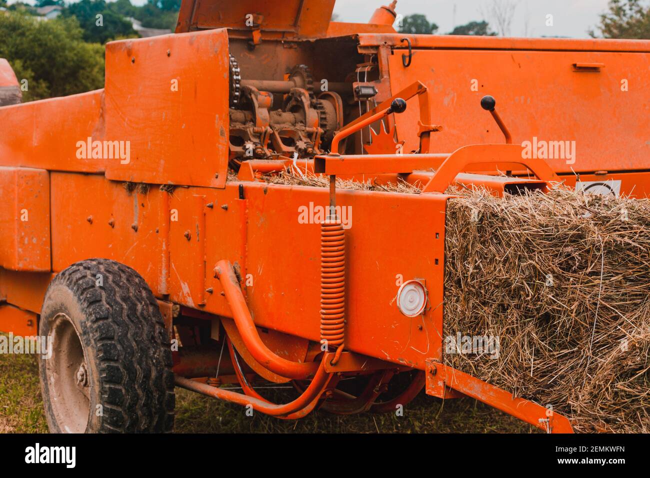 Hay baling press hi-res stock photography and images - Alamy