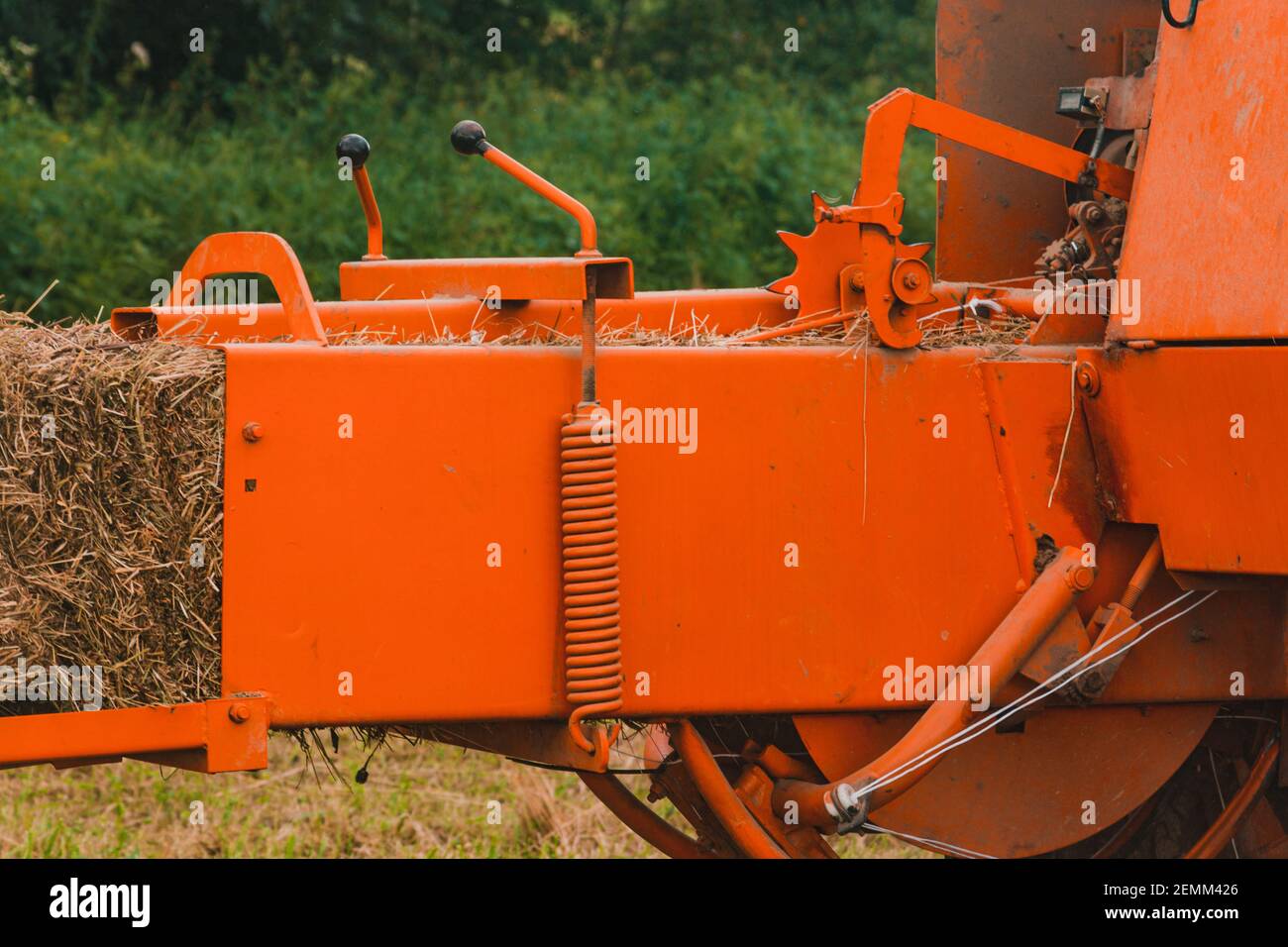 The work of the old hay press, the work of the press close up, details ...