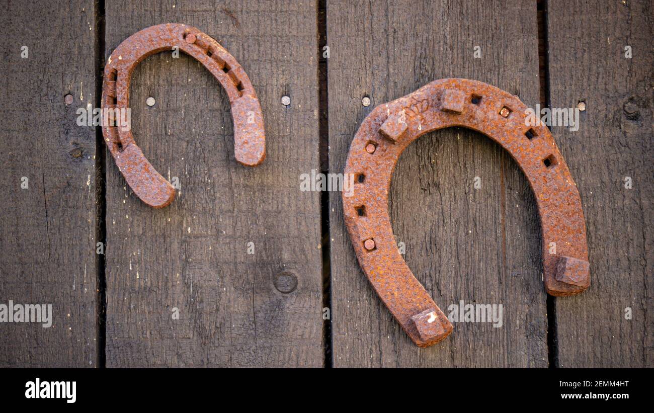 Rusty horseshoe on door hi-res stock photography and images - Alamy
