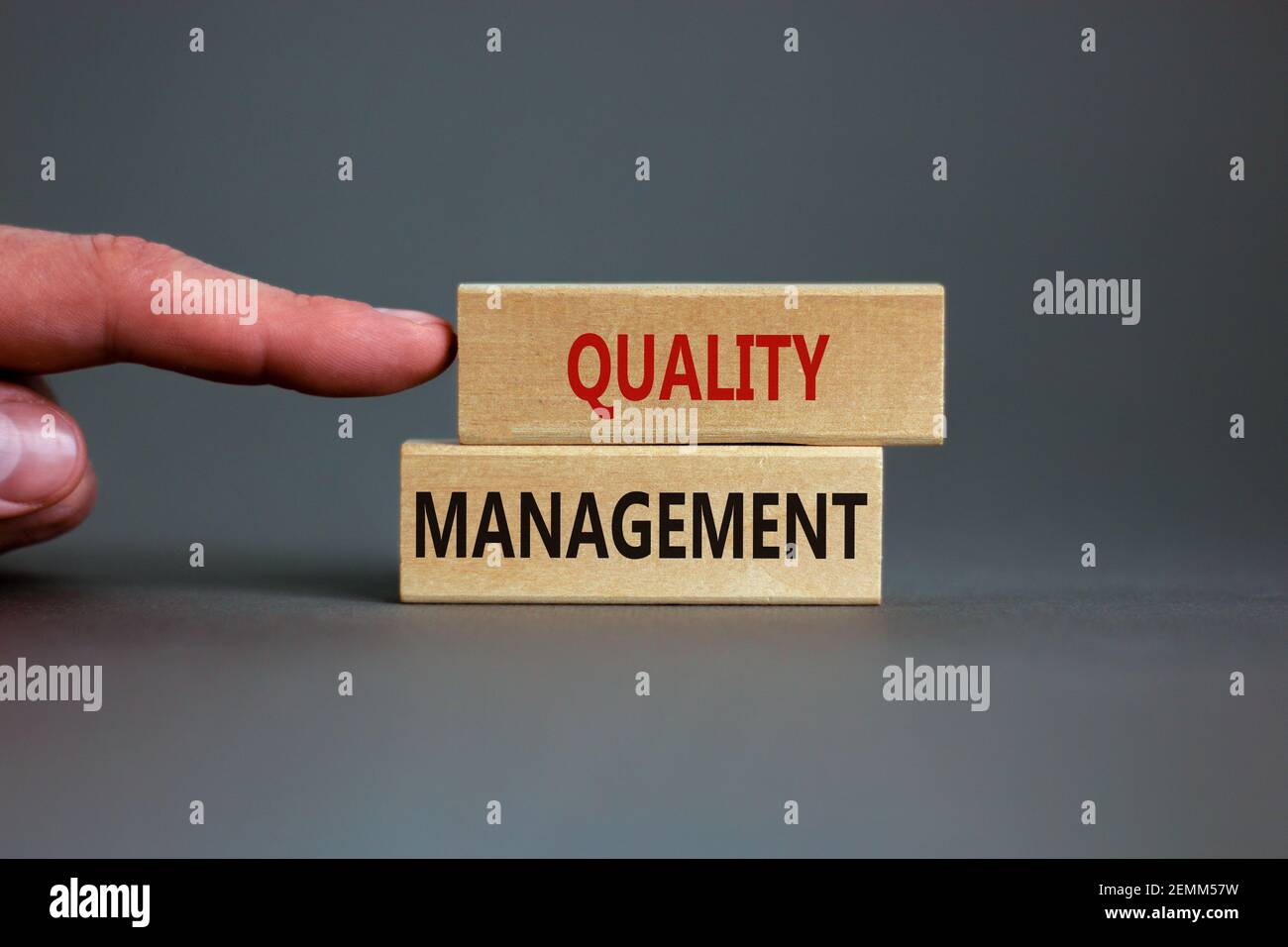 Quality management symbol. Concept words 'Quality management' on wooden ...