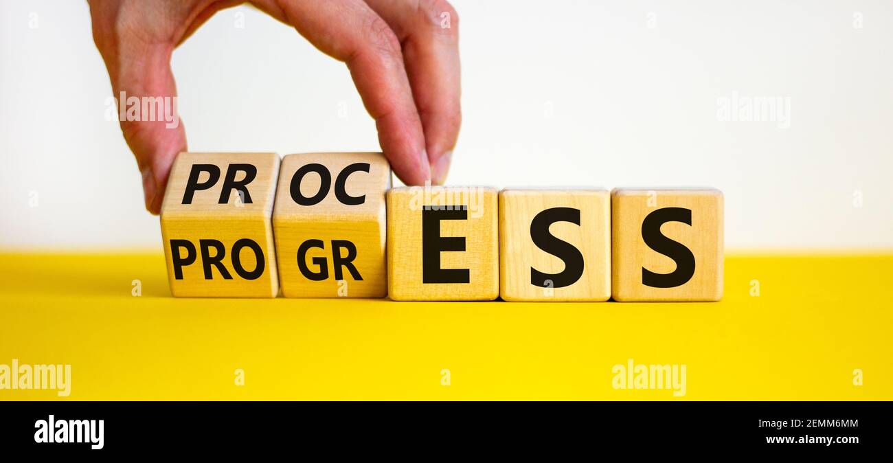 Process and progress symbol. Businessman turns wooden cubes and changes ...