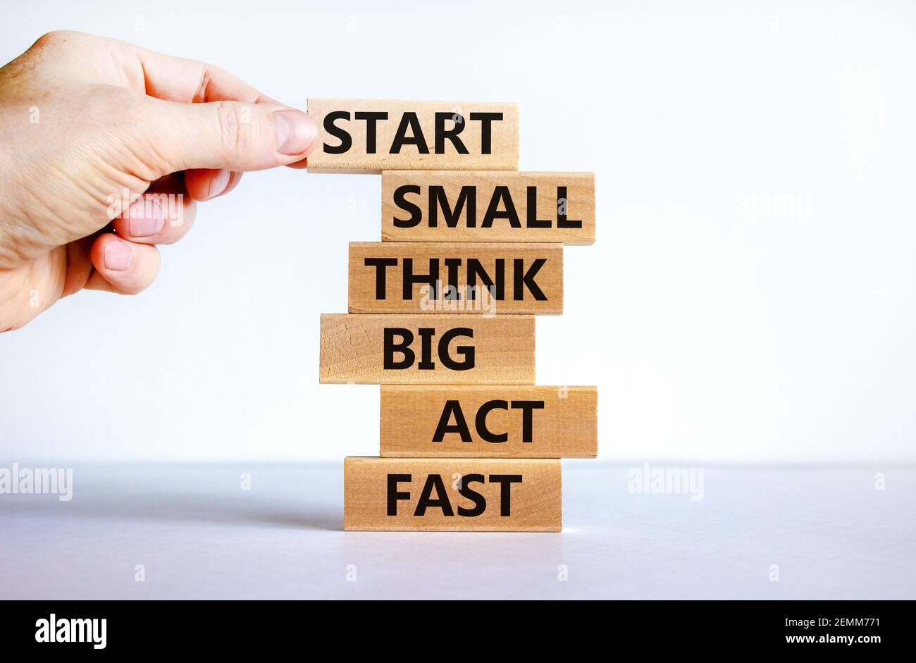 Start small think big symbol. Words 'Start small think big act fast' on ...