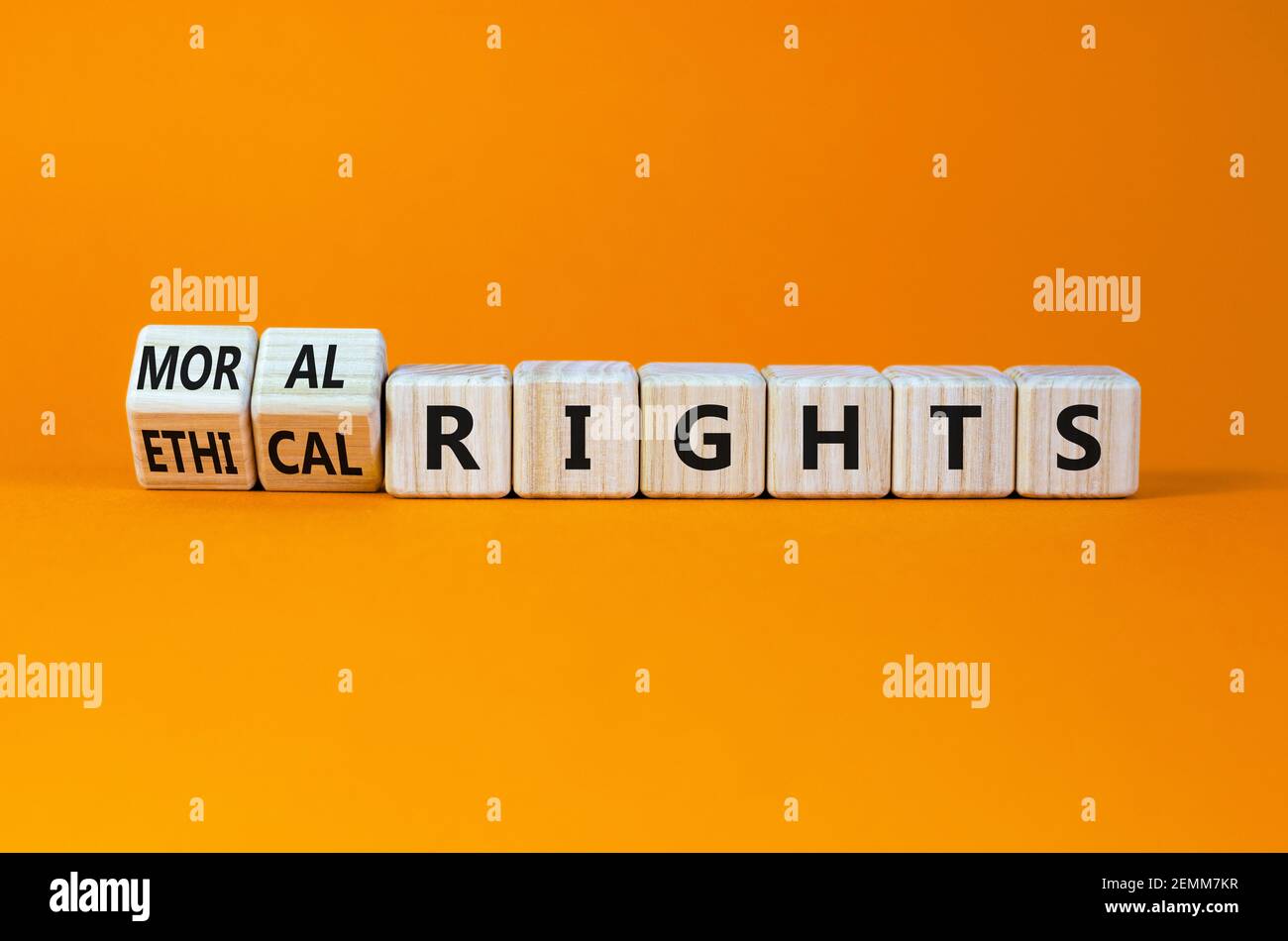 Ethical or moral rights symbol. Turned wooden cubes and changed words ...