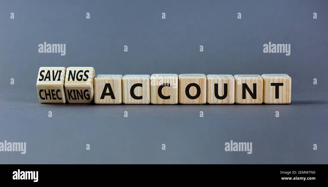 Savings or checking account symbol. Turned wooden cubes and changed ...