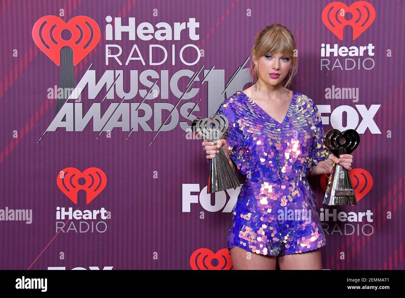 Taylor Swift poses in the press room during the 2019 iHeartRadio Music ...