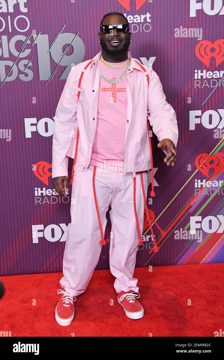 T-Pain poses in the press room during the 2019 iHeartRadio Music Awards ...