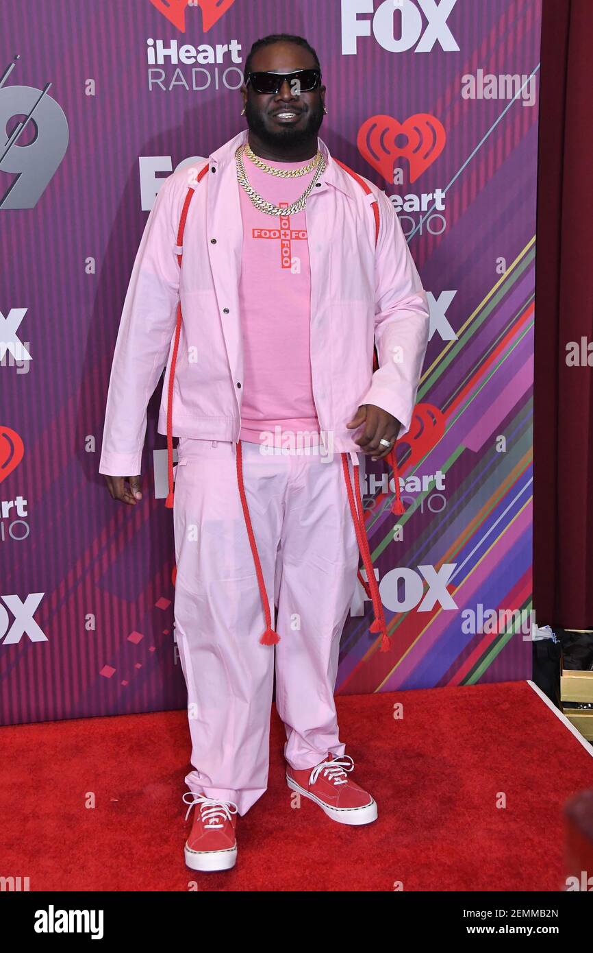 T-Pain poses in the press room during the 2019 iHeartRadio Music Awards ...