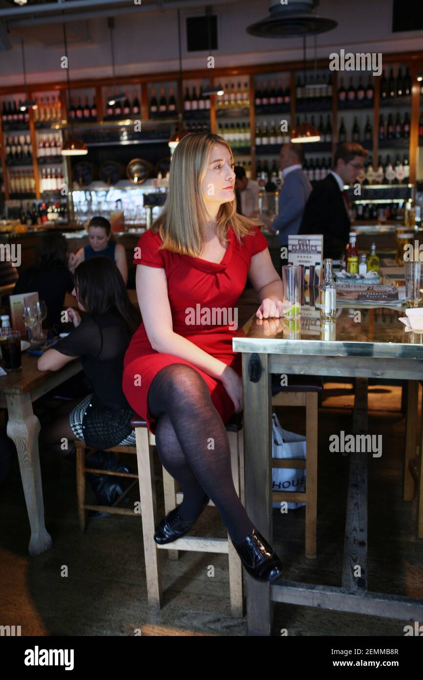 Sophie Morris... Red Dress feature Pic David Sandison Stock Photo - Alamy