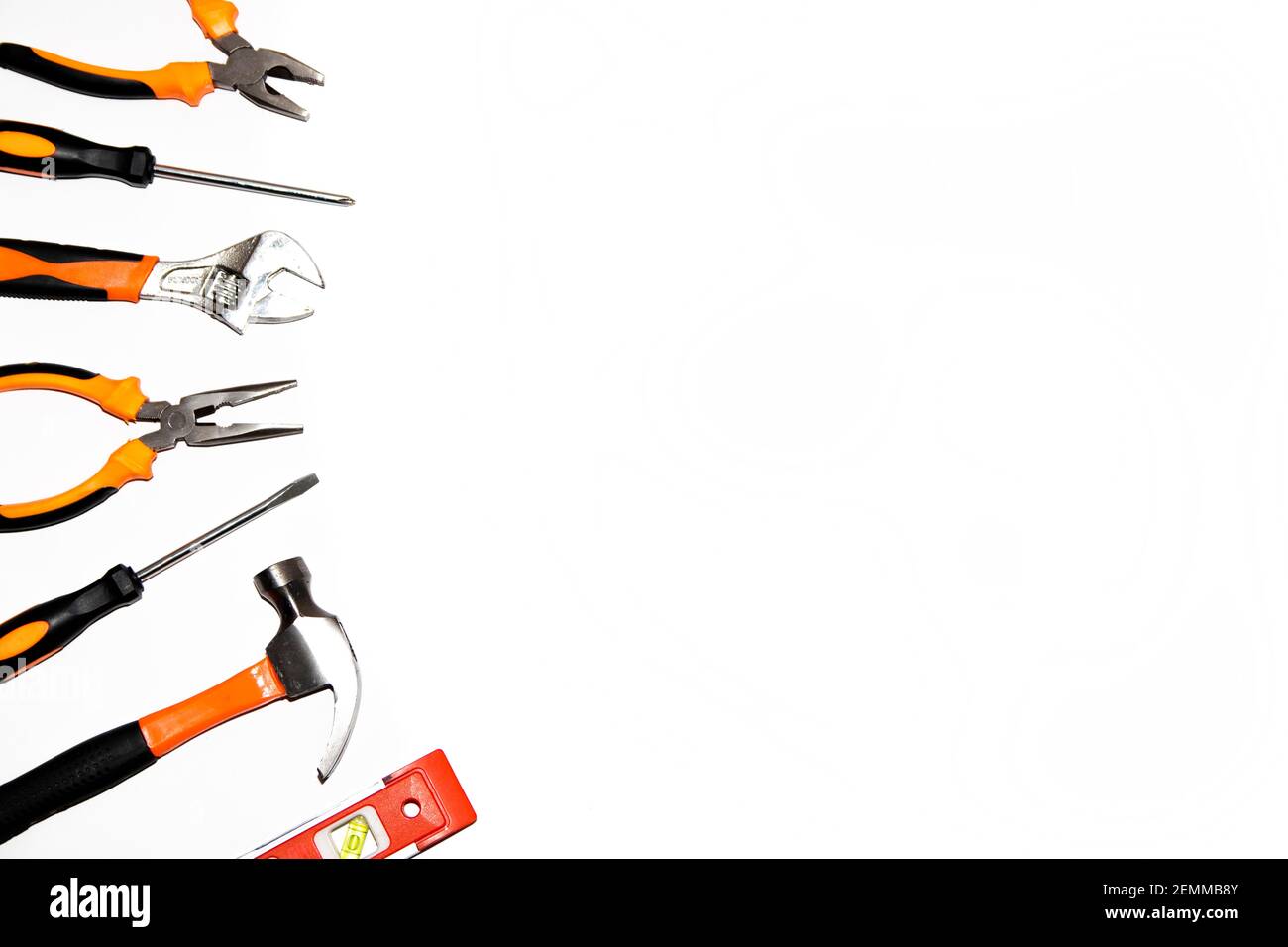 Group of used mechanical tools on a white background. With place for ...