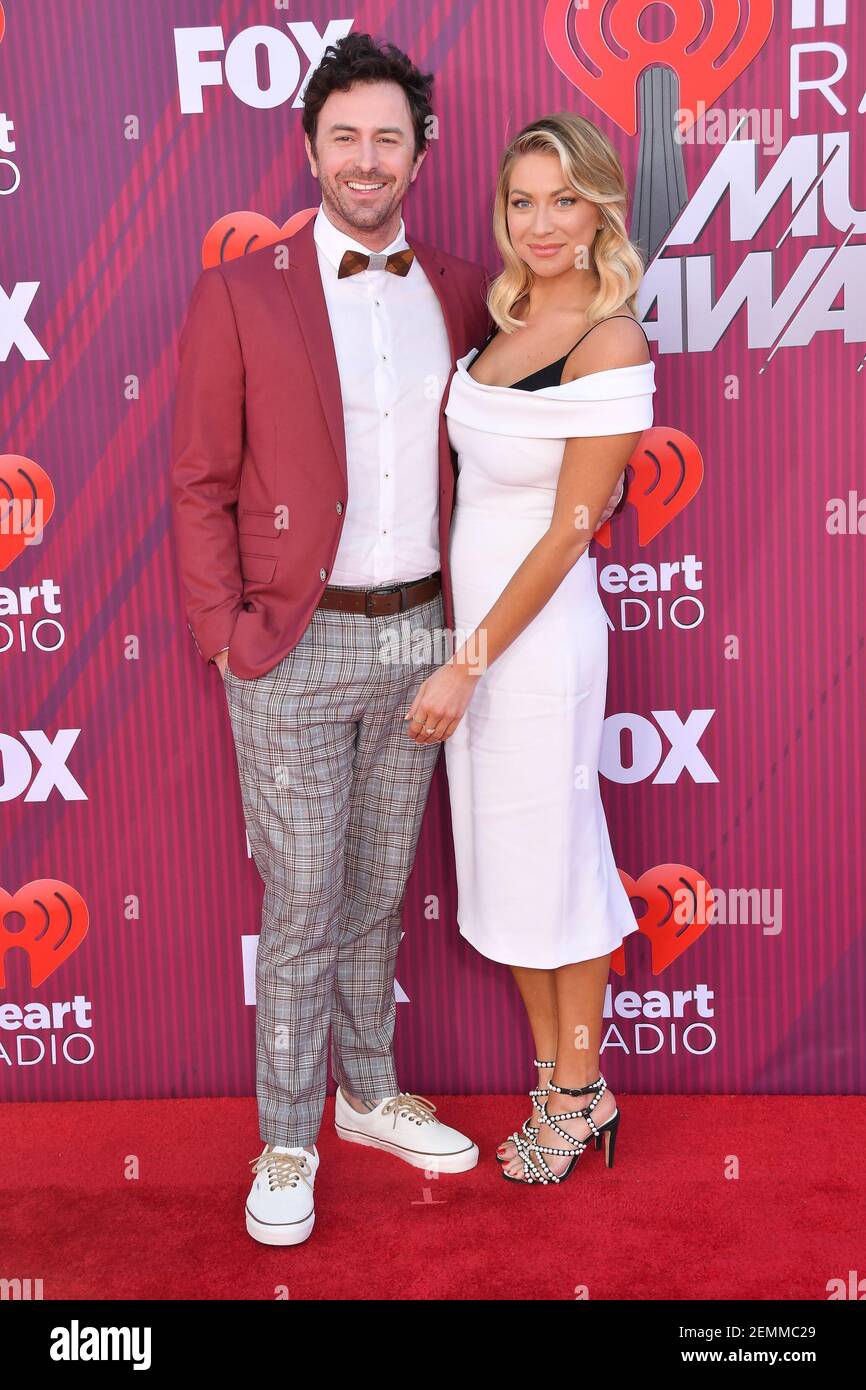 Beau Clark and Stassi Schroeder at the 2019 iHeartRadio Music Awards ...