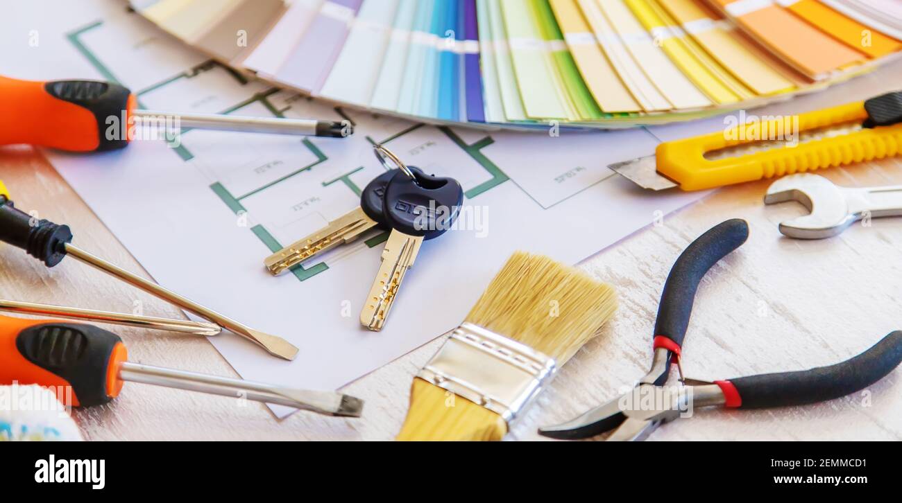 home improvement and renovation concept - construction tools and items ...