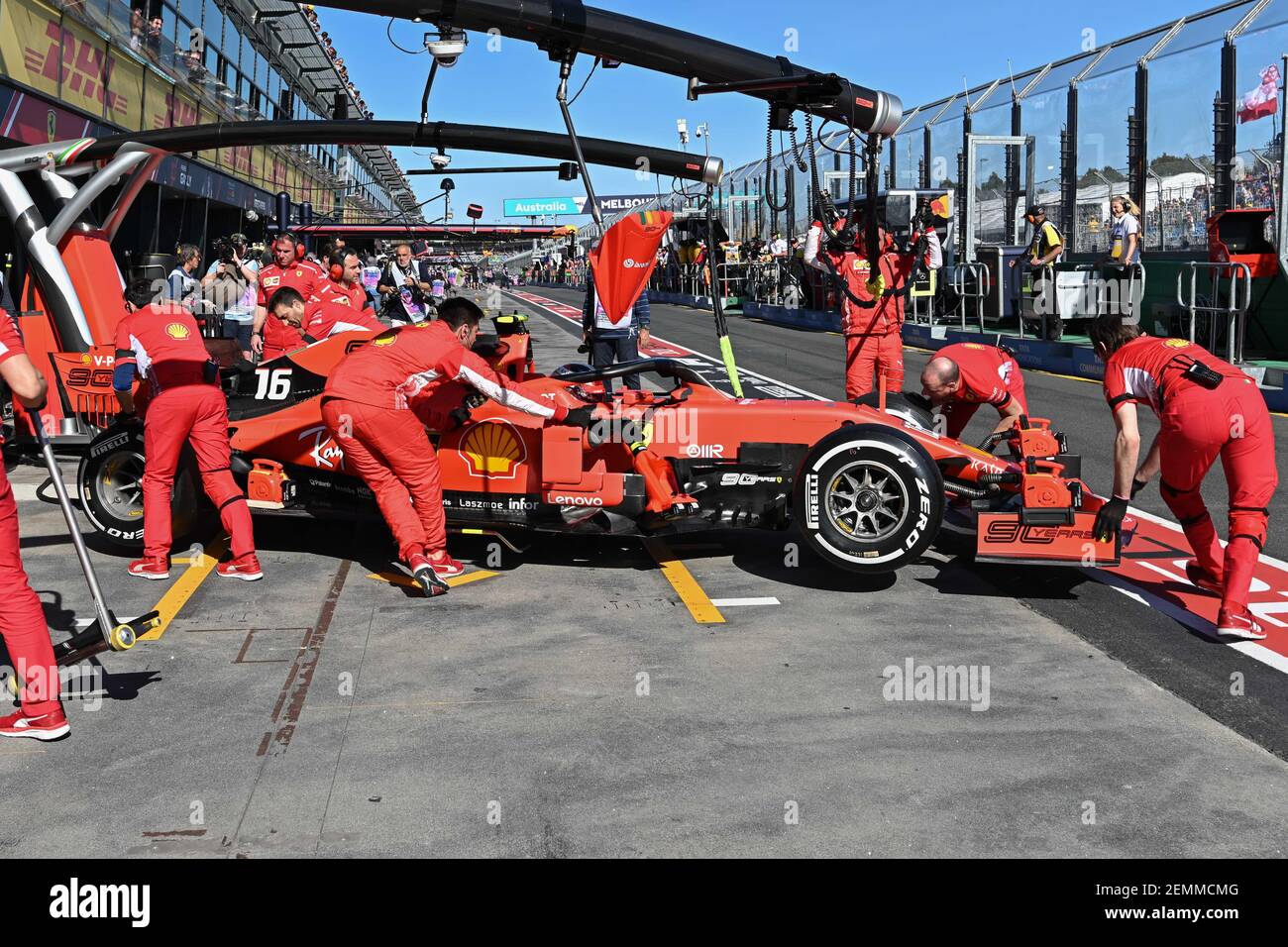 Mechanics work on the car of Sebastian Vettel (DEU) #5 from the Scuderia Ferrari team during ...
