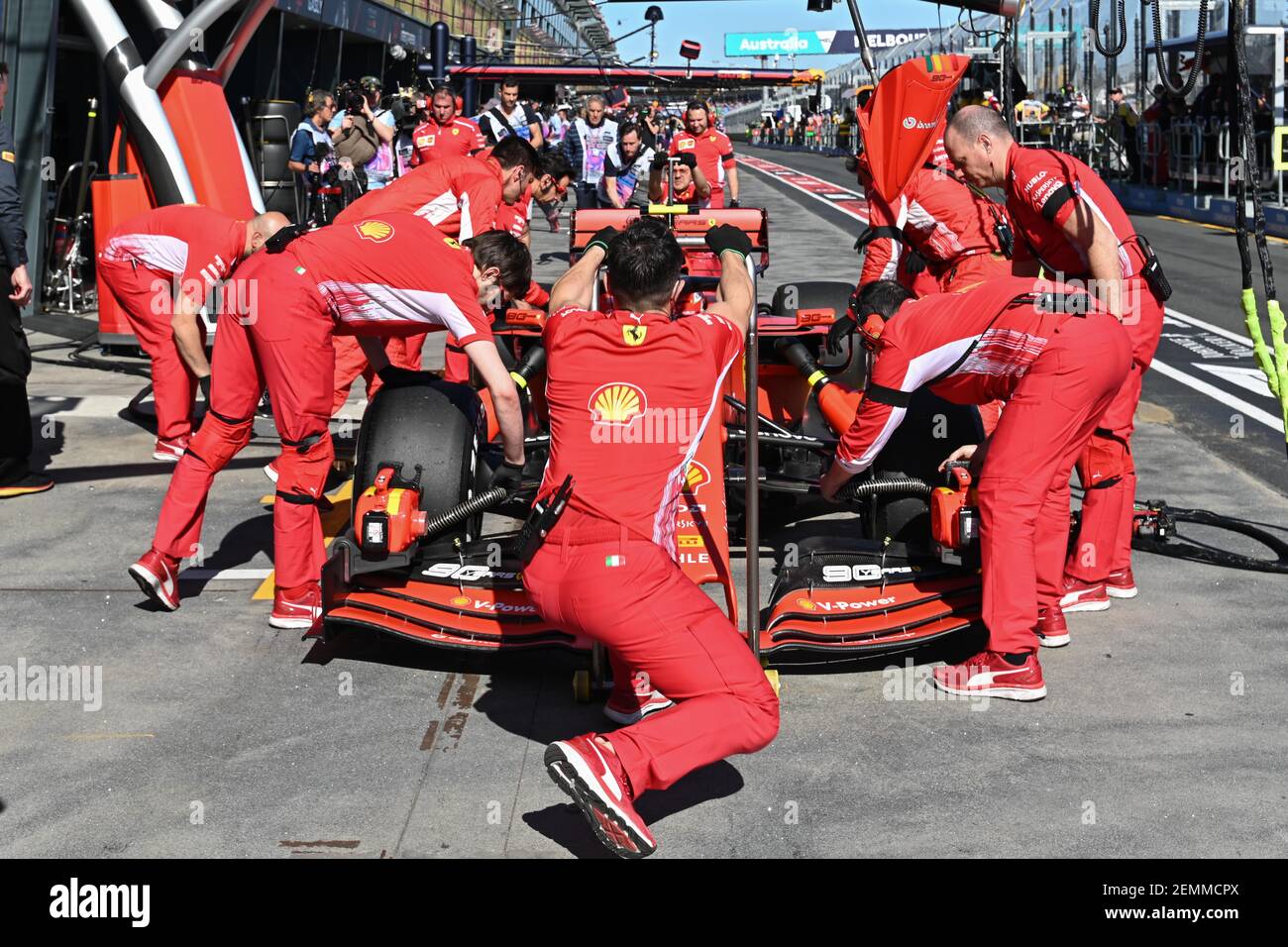 Mechanics work on the car of Sebastian Vettel (DEU) #5 from the Scuderia Ferrari team during ...