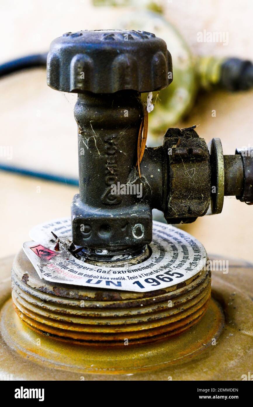 Tap on a gas bottle, France Stock Photo - Alamy