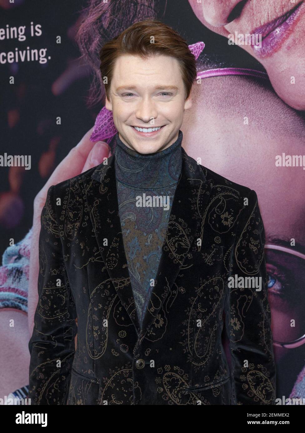 Calum Worthy wearing suit by Etro attends the premiere of Hulu's 'The ...
