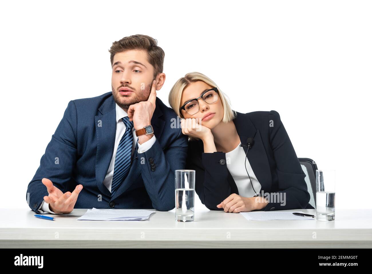 tired blonde news presenter leaning on bored colleague at workplace ...