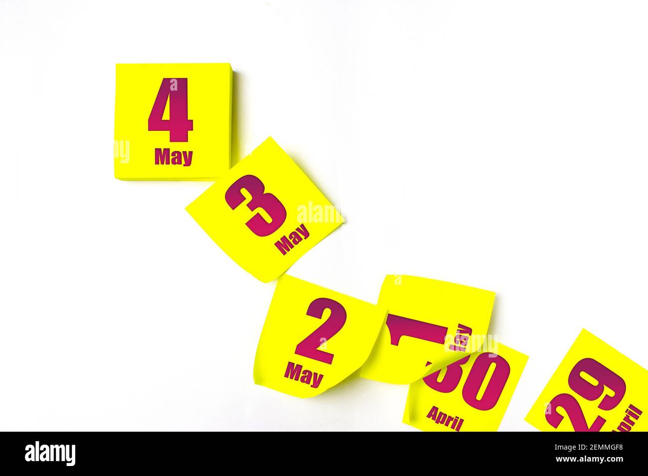 May 4th. Day 4 of month, Calendar date. Many yellow sheet of the ...
