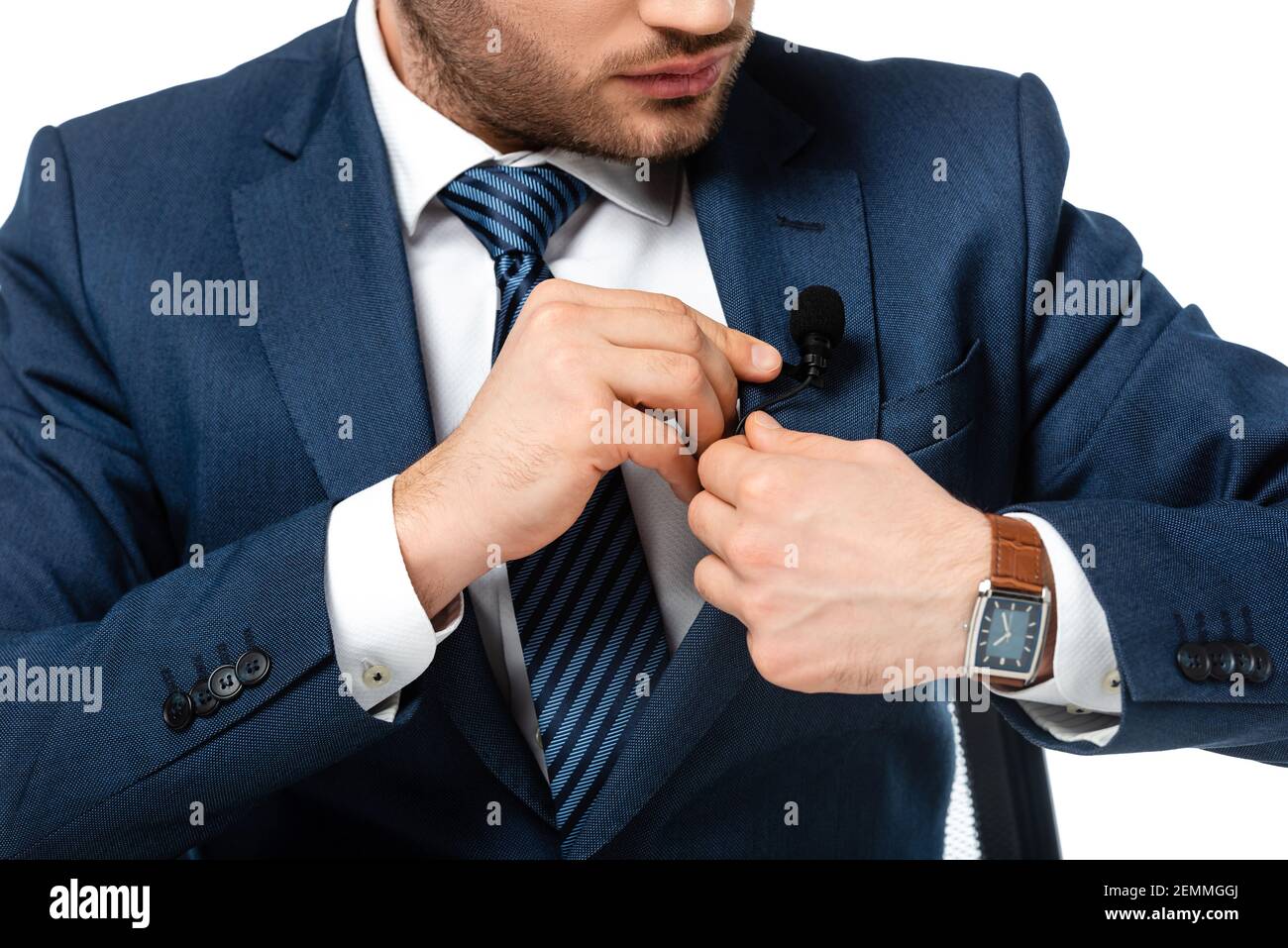 cropped view of news anchor fixing microphone to blazer isolated on ...