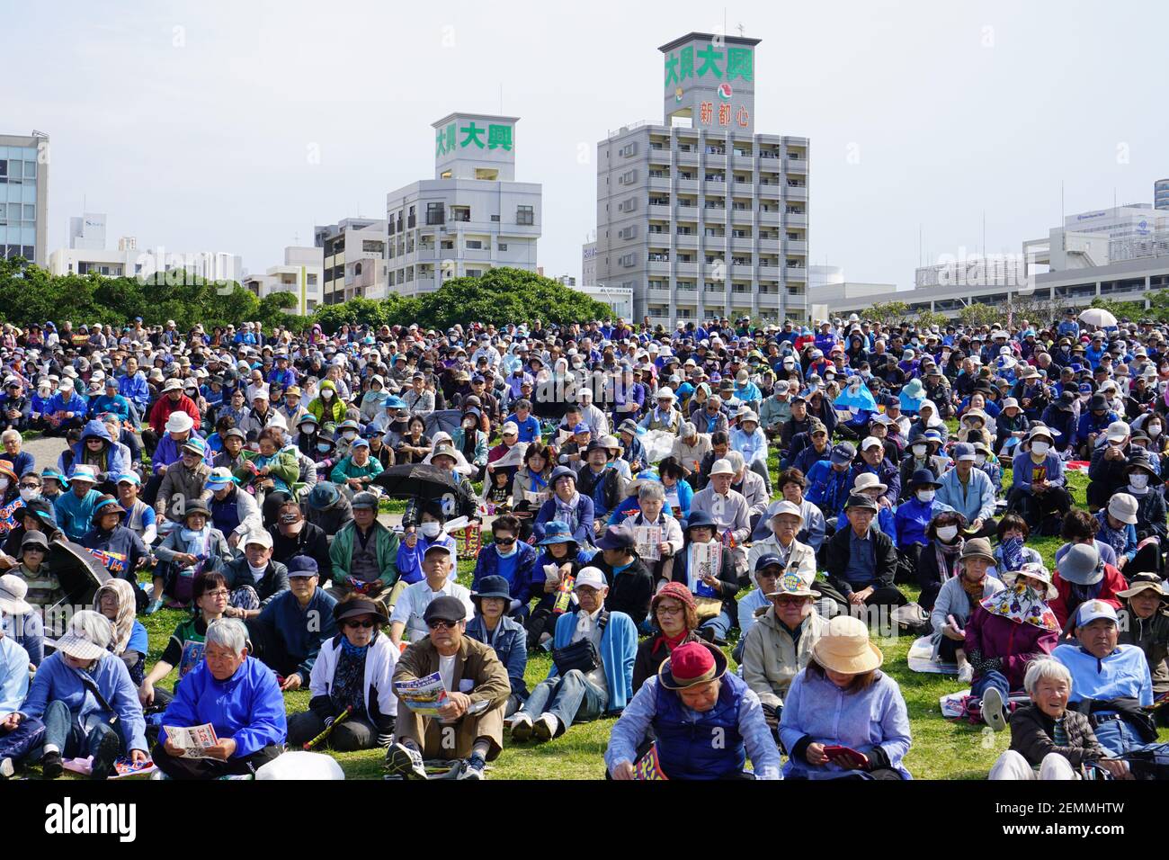 Crowd of citizens seen seated on the ground during the rally. Over ten ...