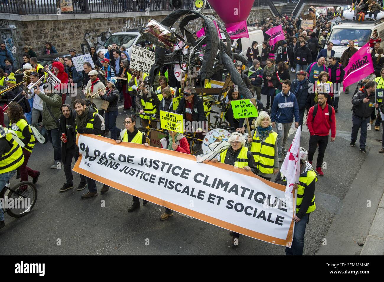 Protesters seen holding a large banner during the March of The Century ...
