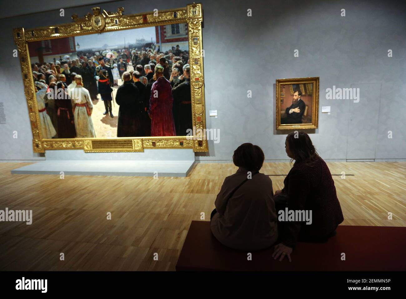 Visitors seen examining the artwork "Emperor Alexander III Receives ...